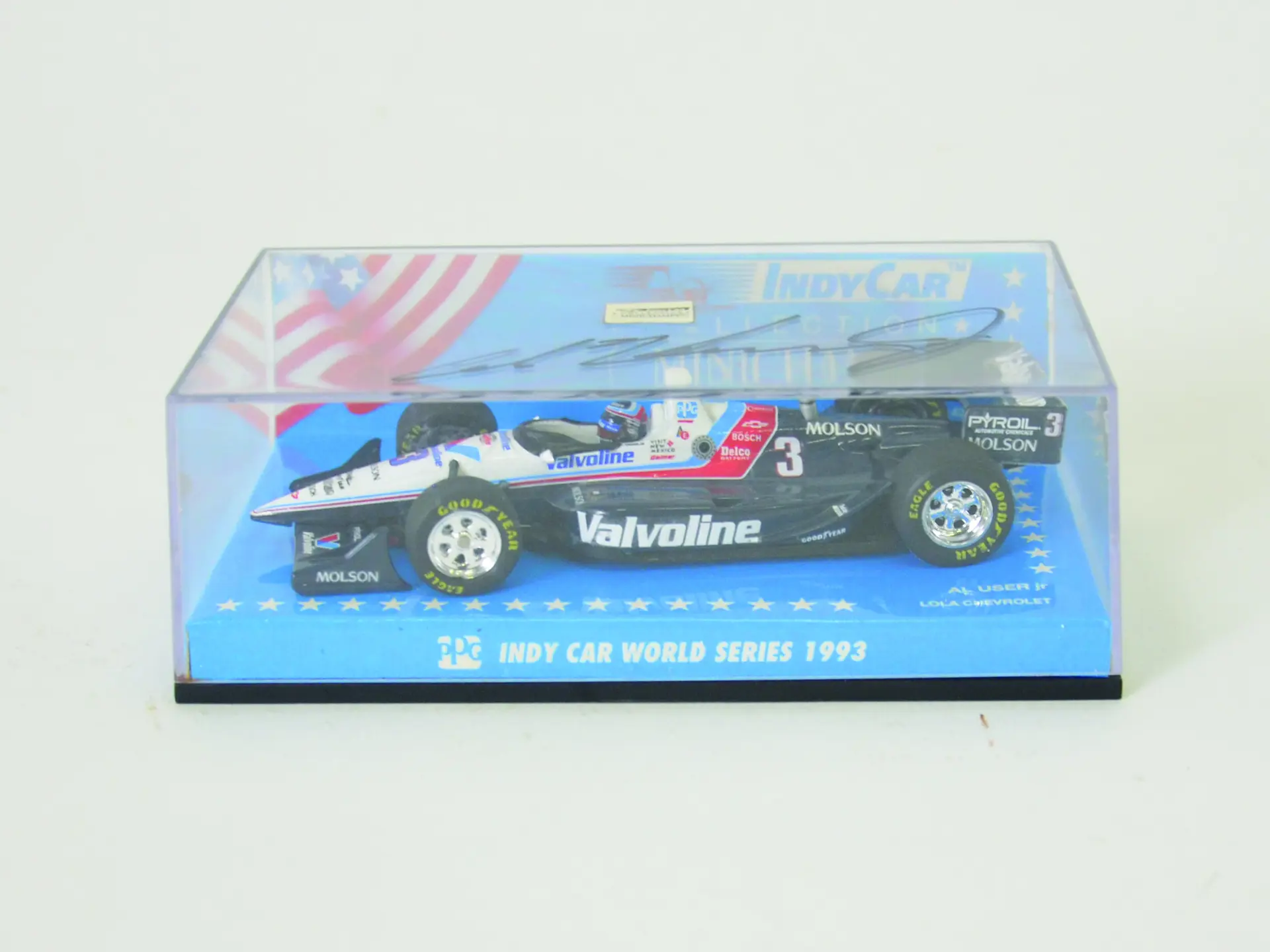 A 1/43 scale mini Champs IndyCar, autographed by Al Unser Jr. | Auburn ...
