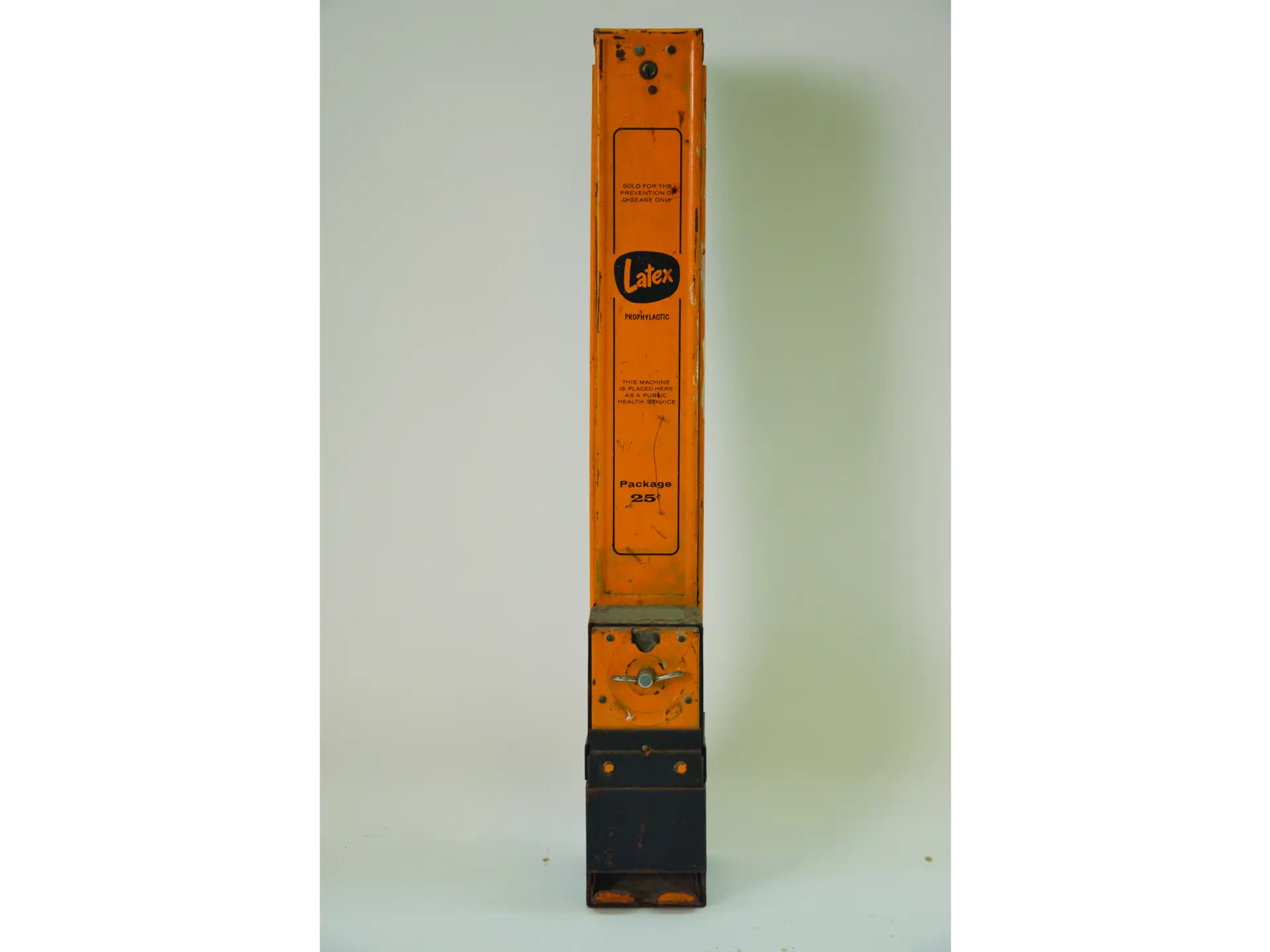 A vintage latex prophylactic dispenser. | Auburn Fall 2016 | RM Sotheby's