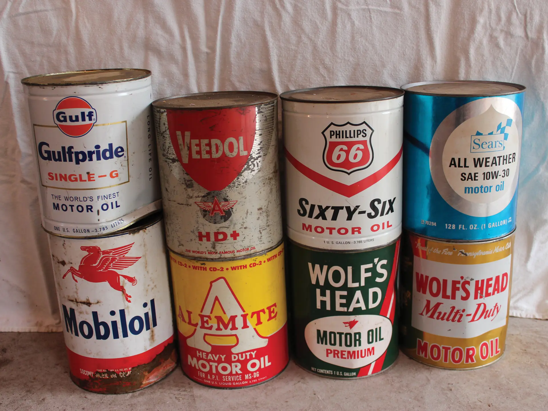 1-Gallon Oil Cans, Full, Eight Pieces | Auburn Spring 2018 | RM Sotheby's