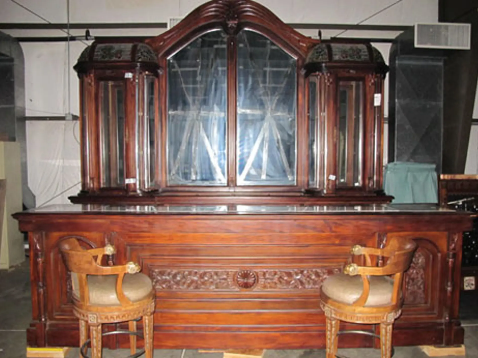 Carved two-piece bar and two bar stools | Auburn Fall 2012 | RM Sotheby's