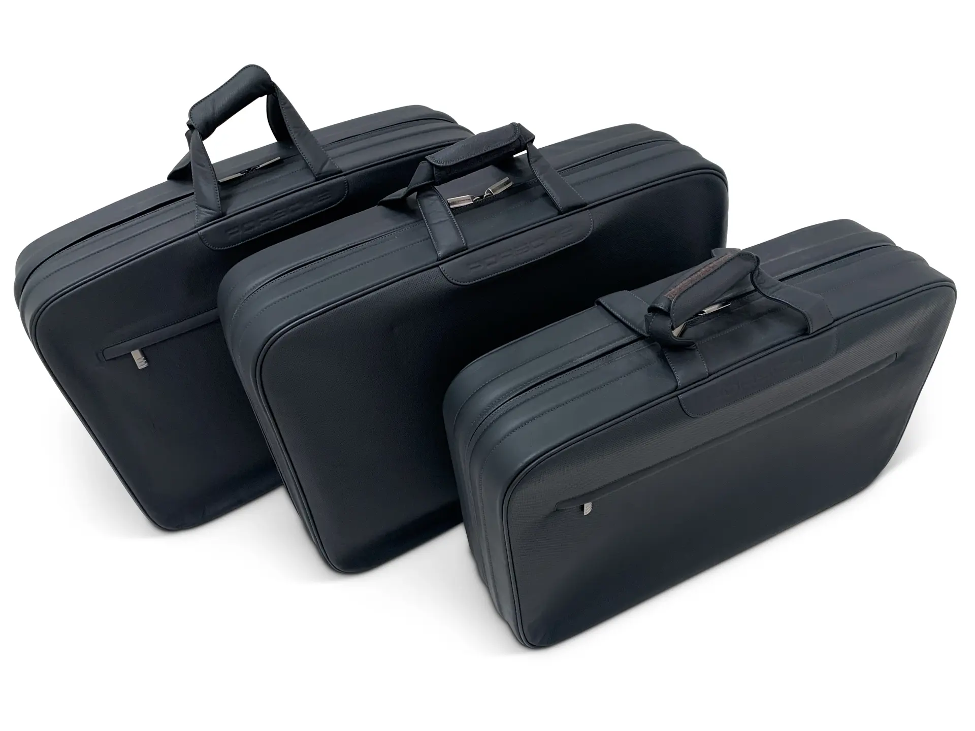 Three Perforated Leather Porsche Suitcases | The White Collection ...