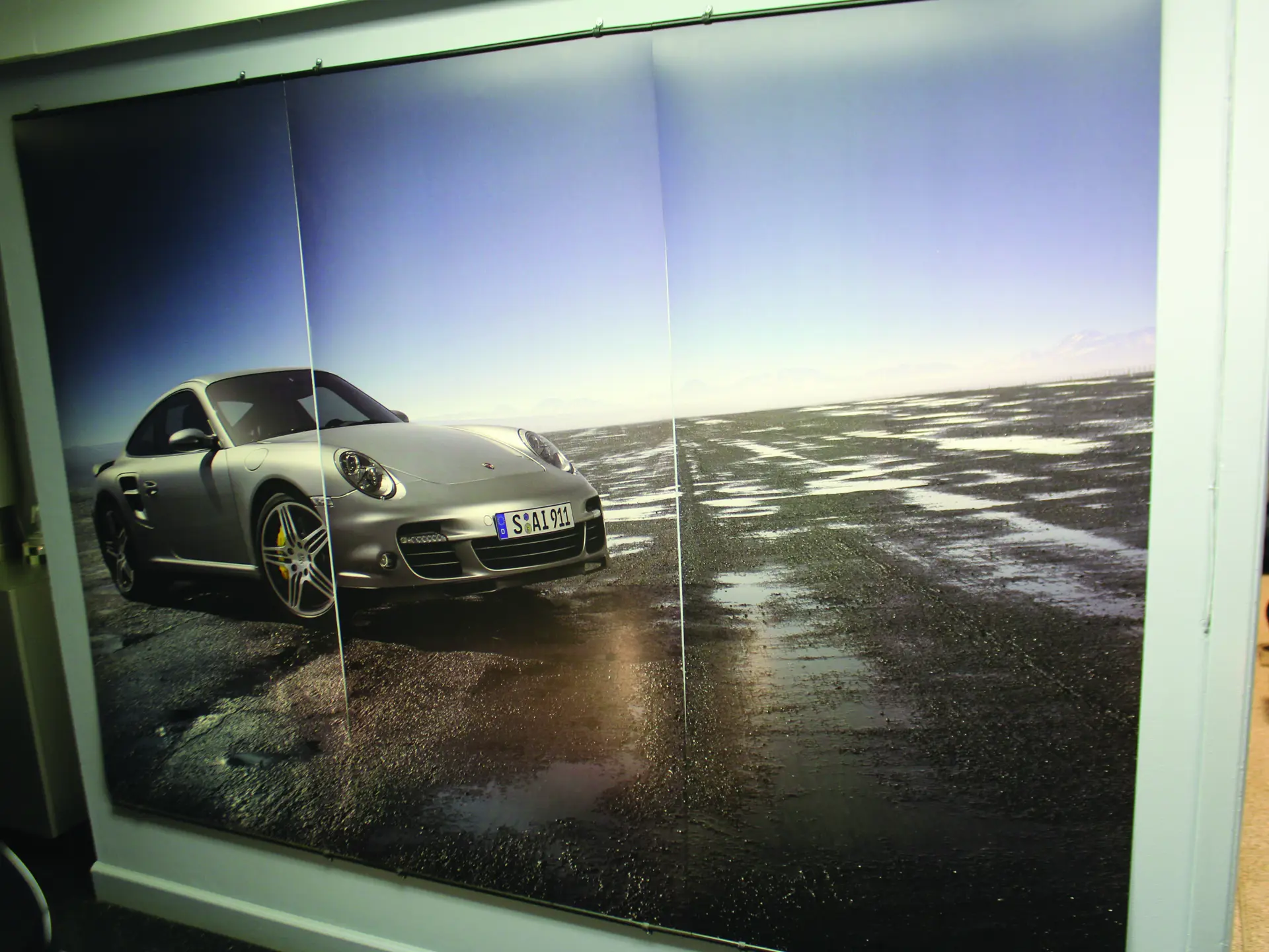 Porsche Dealer Wall Art 67in x 95in | Fort Lauderdale 2017 | RM Sotheby's